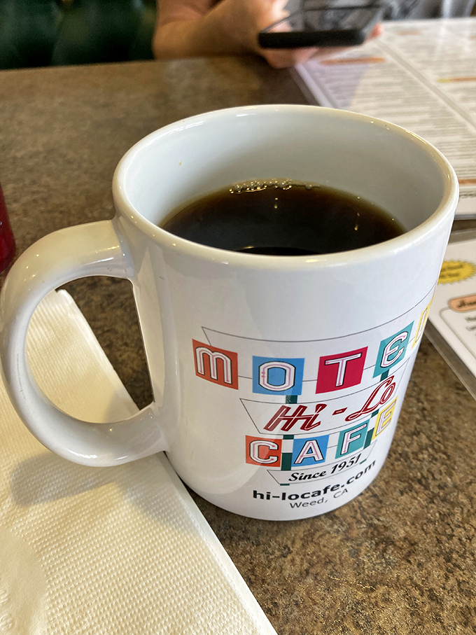 Coffee served in a mug that's seen thousands of refills and morning conversations. The unofficial fuel of Weed, California.