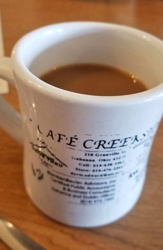 The coffee mug tells you everything&mdash;this isn't just a place to eat, it's an institution where the caffeine flows as freely as the conversation.