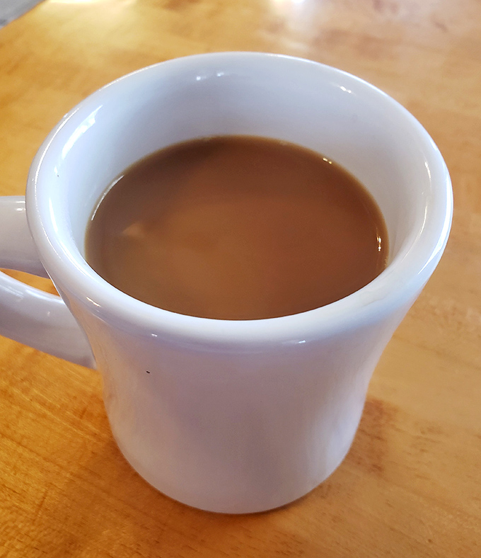 A simple mug of diner coffee&mdash;the kind that doesn't need fancy Italian names or artisanal foam designs to get the job done right.