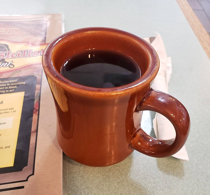 The humble brown coffee mug&mdash;civilization's most honest vessel. No fancy latte art needed when the coffee itself deserves the spotlight.