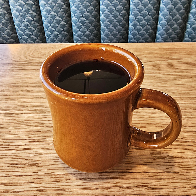 The humble brown diner mug—delivering liquid motivation since forever. This coffee doesn't need fancy names or elaborate preparation to hit the spot.