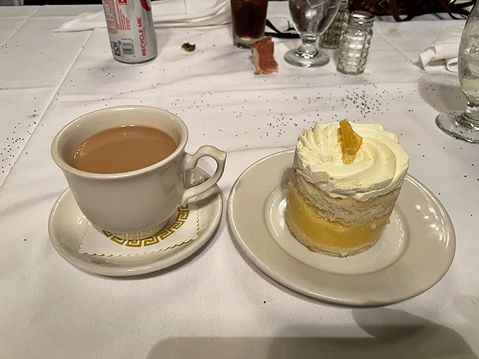 Coffee and dessert&mdash;the encore after the main performance. That whipped cream mountain could double as a pillow for sweet dreams.