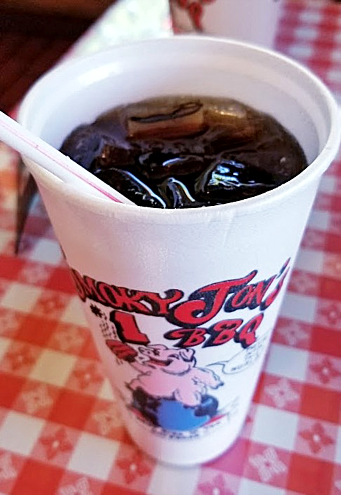 Even the drinks come with attitude at Smoky Jon's, where every sip of cola washes down barbecue perfection in branded cups that scream "experience."