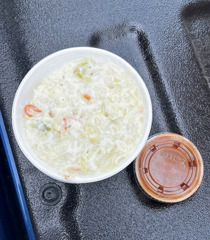 Cole slaw that knows its role&mdash;cutting through the richness while adding its own creamy character to the barbecue symphony.