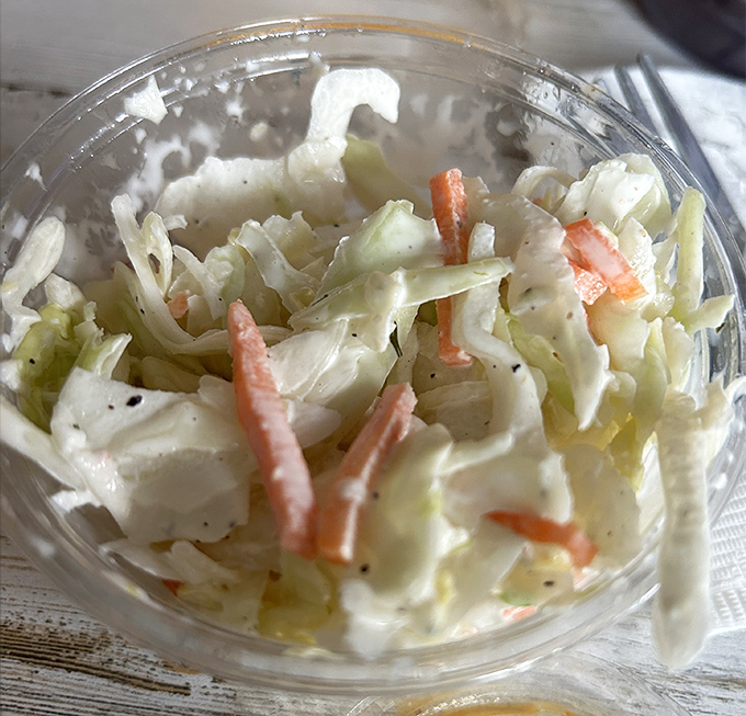Coleslaw that actually deserves a place on your plate rather than being pushed aside. Crisp, fresh, and the perfect counterpoint to fried indulgence.