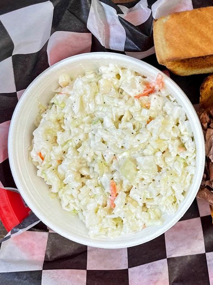 Coleslaw that knows its role &ndash; cool, crisp relief from the smoky richness, not an afterthought but an essential supporting character.