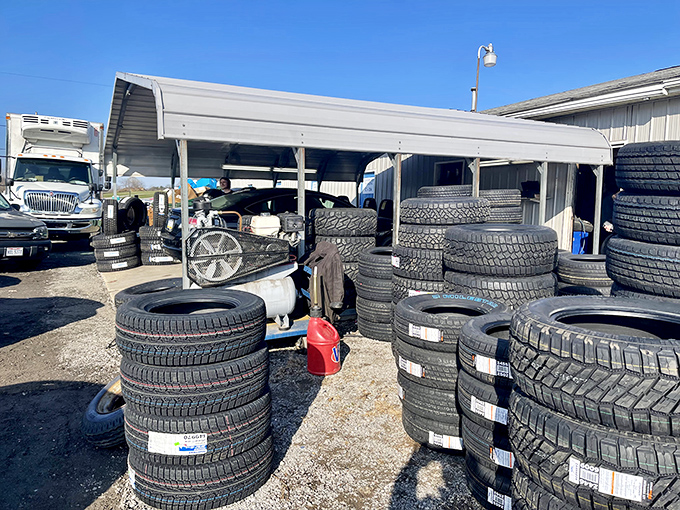 Rubber meets the road at Rogers' automotive section, where practical shoppers find tires stacked like donuts at a police convention.