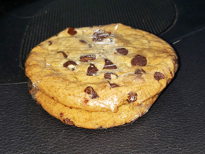 Chocolate chip cookies wrapped like precious cargo, waiting patiently behind clear plastic. These aren't pretentious $7 bakery cookies—they're honest, homestyle comfort.