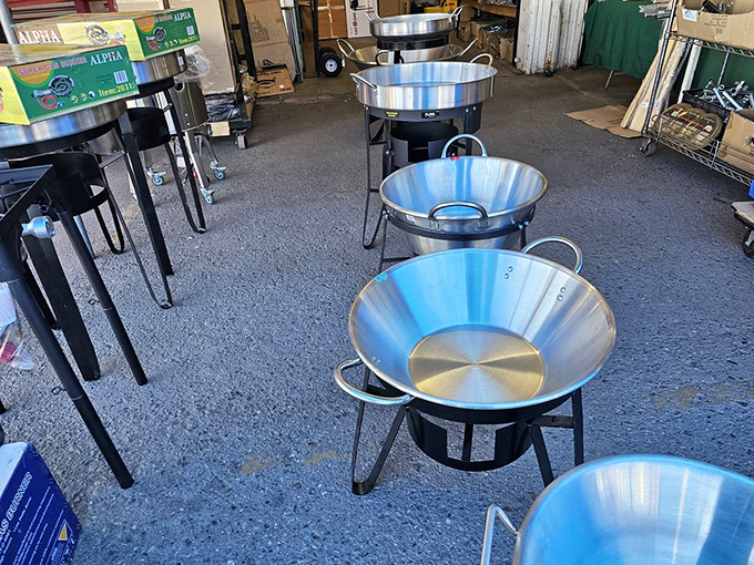 Gleaming cookware awaits new kitchens, ready to create memories one meal at a time.