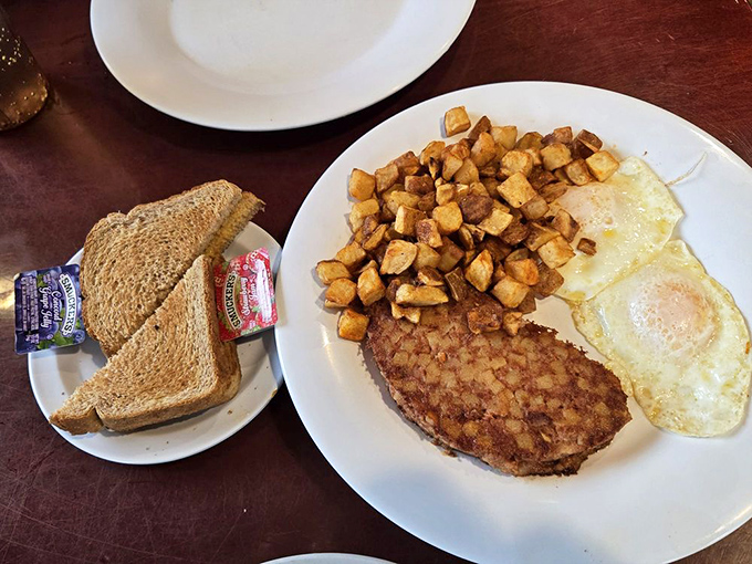 A classic diner breakfast with perfectly seasoned corned beef hash, eggs, and country potatoes&mdash;the holy trinity of morning satisfaction.