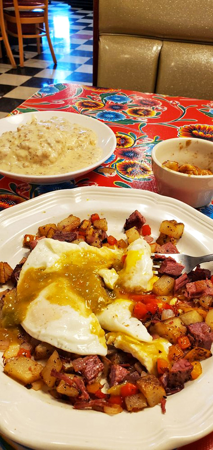 Eggs, potatoes, and corned beef hash&mdash;the holy trinity of breakfast, arranged on a plate like edible modern art.