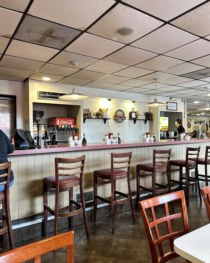 The counter at Nicki's &ndash; where solo diners become temporary neighbors and the coffee flows as freely as the conversation.