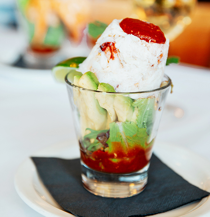 A seafood cocktail that's dressed better than most people at the Oscars. Layers of flavor in a glass that's worth raising.