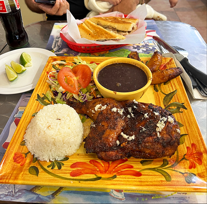 When chicken gets the Cuban treatment, it transforms into this glorious plate where every component deserves its own thank-you note.