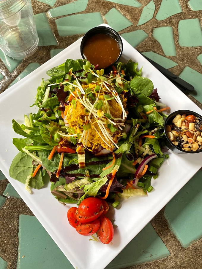 A salad that makes you forget you're eating something healthy. Those vibrant greens are just vehicles for delivering pure flavor satisfaction.
