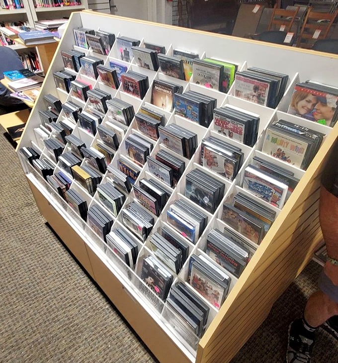 Vinyl treasures and forgotten films organized with NASA-level precision. Your next dinner party soundtrack is hiding somewhere in these rows.