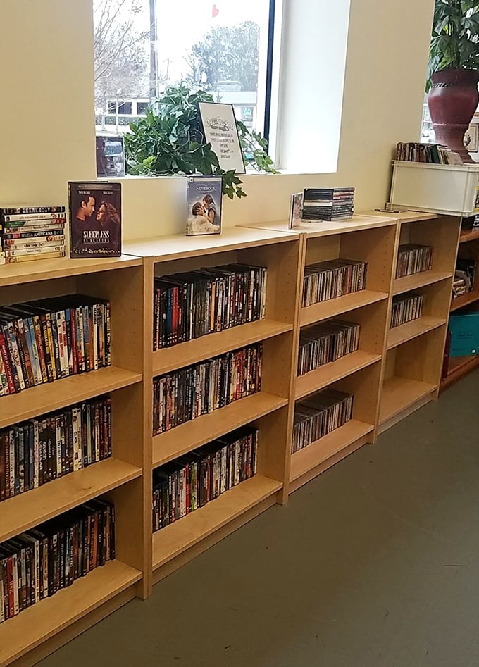 The DVD section is a time capsule of entertainment history, where forgotten favorites wait to be rediscovered on rainy Georgia afternoons.
