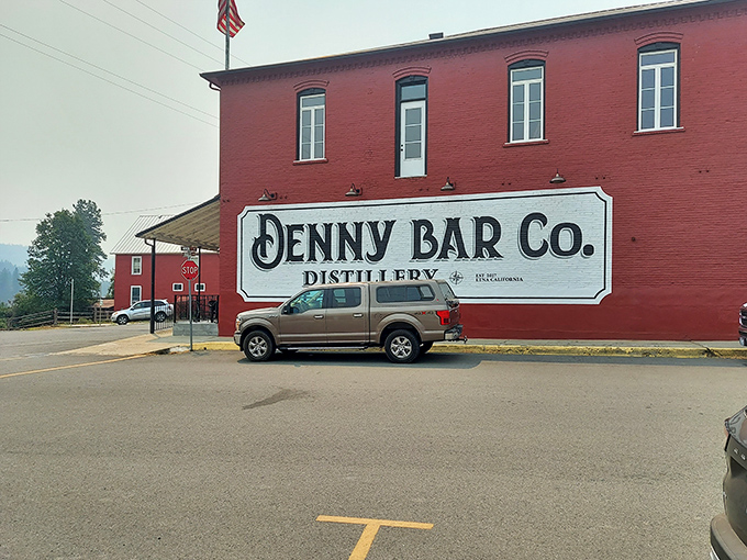 Denny Bar Co. Distillery's bold red brick building stands as a testament to craft spirits and the art of repurposing historic architecture.