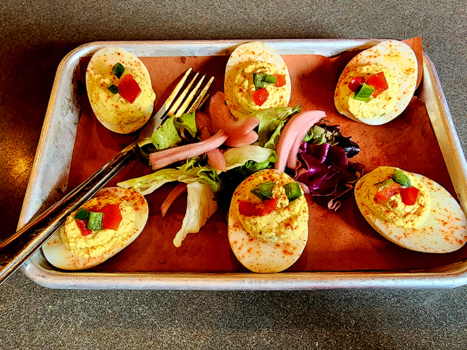Deviled eggs get dressed up for their night out, proving that simple pleasures deserve fancy accessories too.