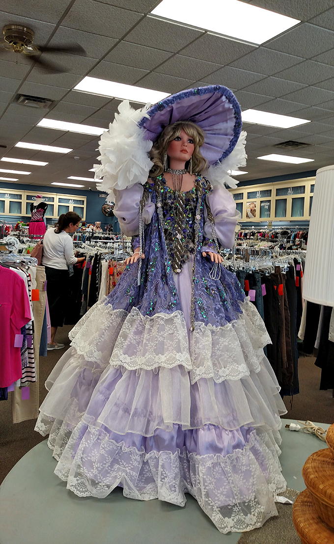 Meet the store's unofficial greeter, dressed more elaborately than anyone at the last royal wedding. She's seen things, this one.