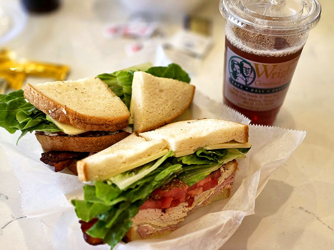 A club sandwich that makes all other clubs look like they need better membership requirements. Triple-decker perfection that demands a strategic eating plan.