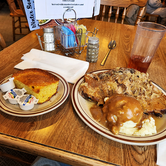 Cornbread and potatoes sharing a plate like old friends at a reunion. Simple food done right never needs to shout for attention.