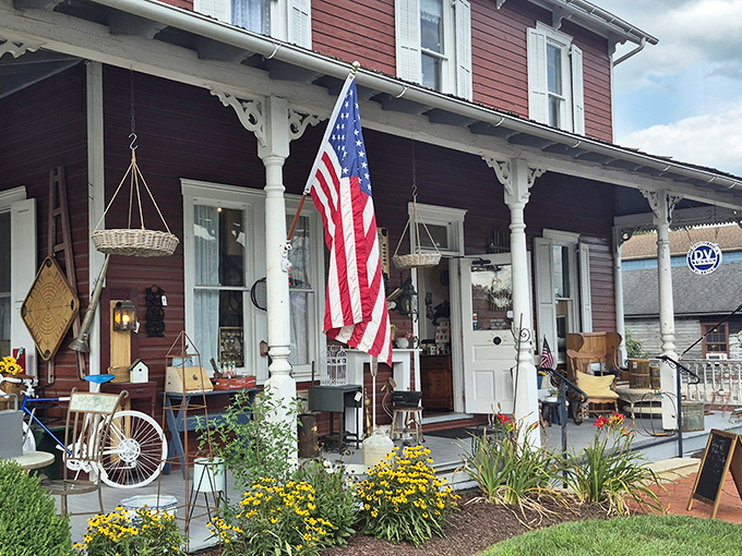 Front porch Americana that makes HGTV designers weep with joy. Wicker baskets, flag, and flowers&mdash;the original social network.