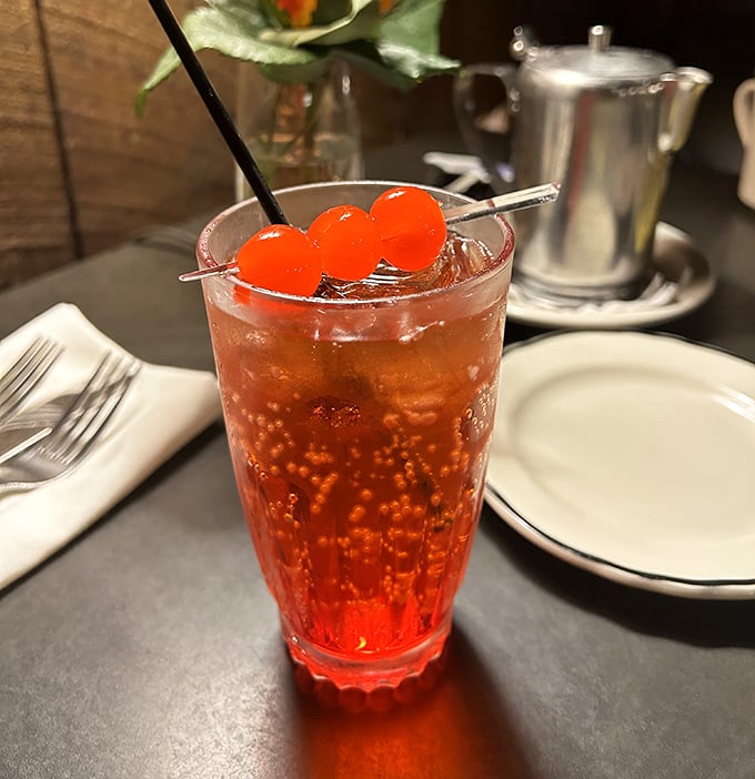 Three cherries in a fizzy cocktail: either the beginning of a wonderful evening or the winning pull on life's slot machine of simple pleasures.