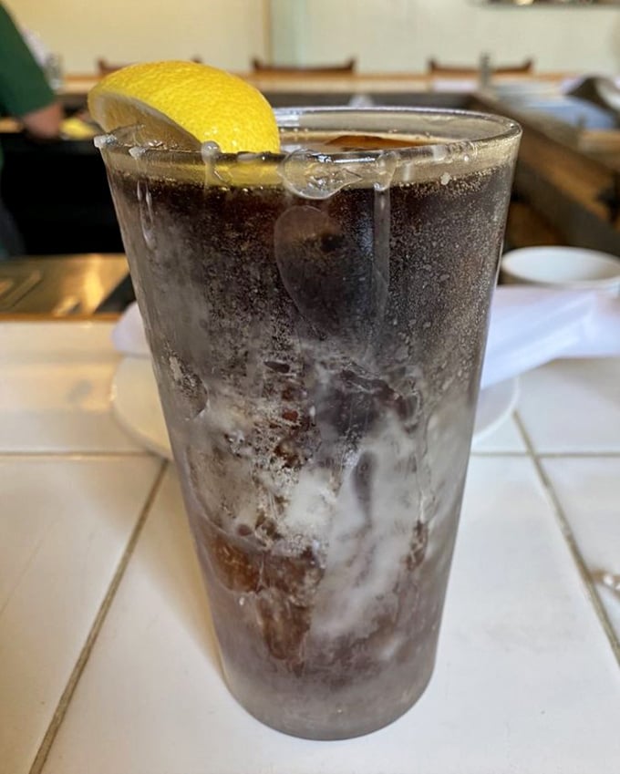 Even the drinks come with a view – a tall, cool companion that knows its role is supporting actor to the seafood's star performance.