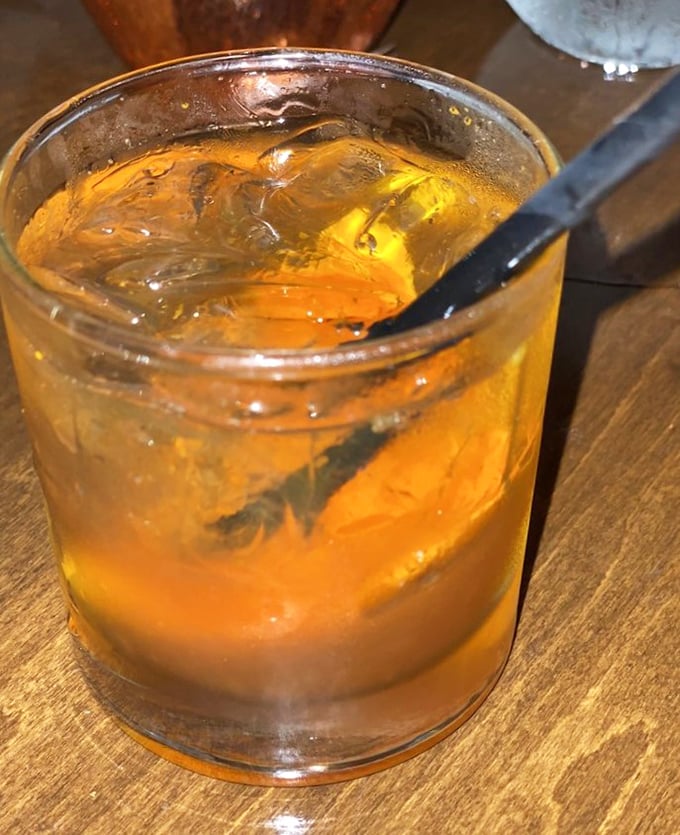 An old fashioned that would make Don Draper weep with joy, amber liquid catching the light like liquid gold.