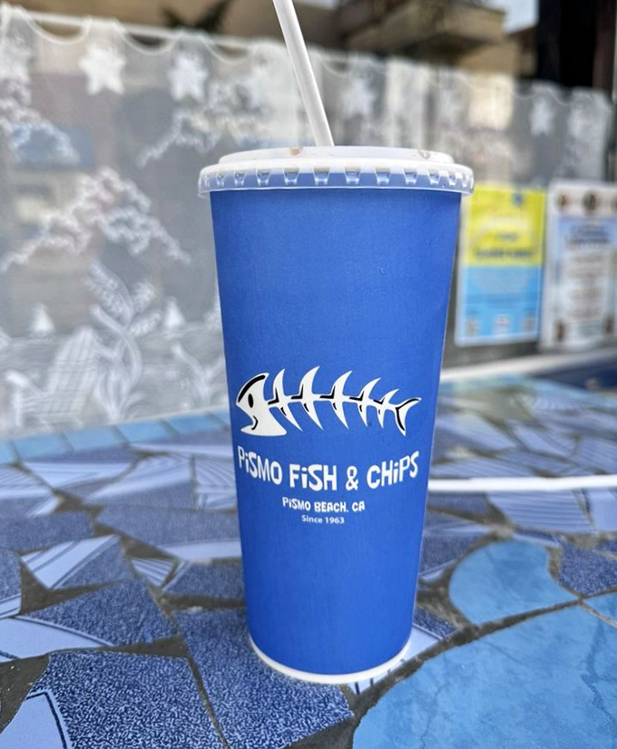 Even the beverages get the signature fish bone logo treatment at this thoroughly committed establishment.