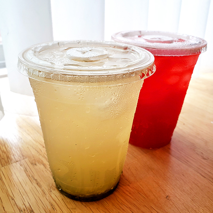 Cold drinks in plastic cups&mdash;the perfect companions to a serious sandwich session. Sometimes the simplest pleasures are the most satisfying.