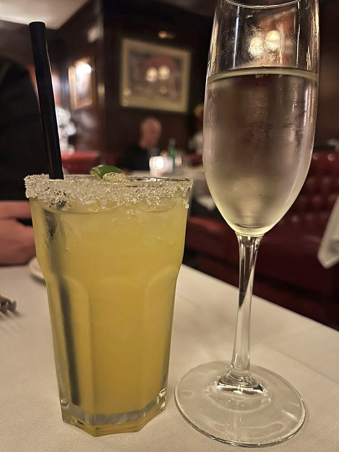 Cocktail hour done right: a salt-rimmed margarita alongside champagne. Because sometimes one celebratory drink simply isn't enough.
