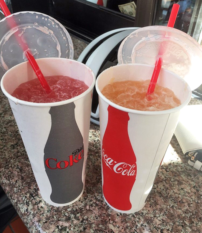 Agua frescas in their natural habitat. These aren't just drinks; they're liquid desserts that somehow make you feel virtuous.