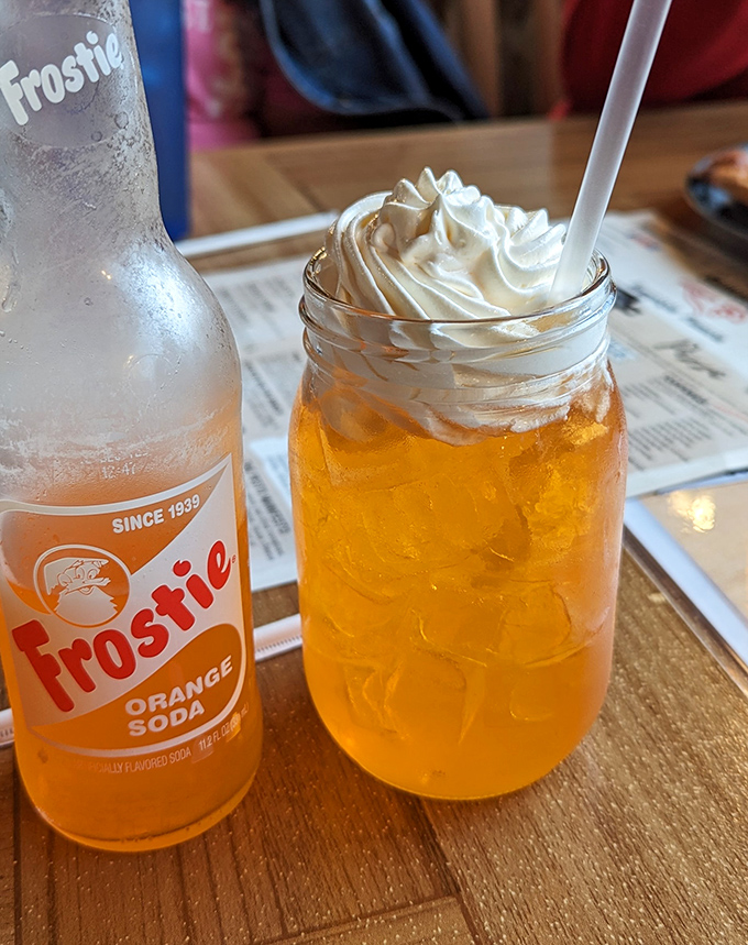 Nothing complements pizza like a mason jar of orange soda topped with whipped cream. Nostalgic sipping at its finest.