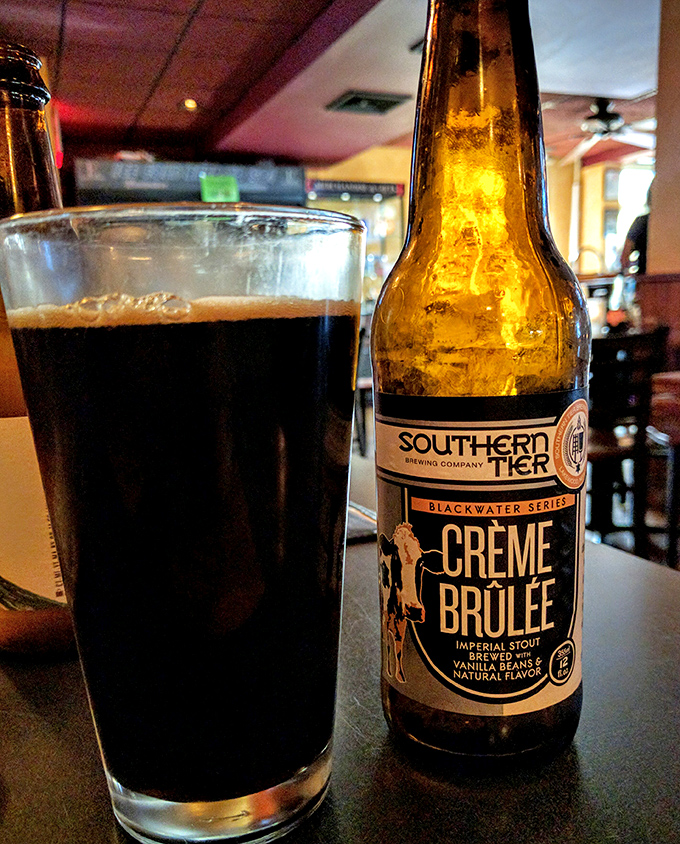 A proper pint of stout alongside Southern Tier's Cr&egrave;me Br&ucirc;l&eacute;e beer&mdash;proof that Pennsylvania knows good beer isn't just a beverage; it's a companion.