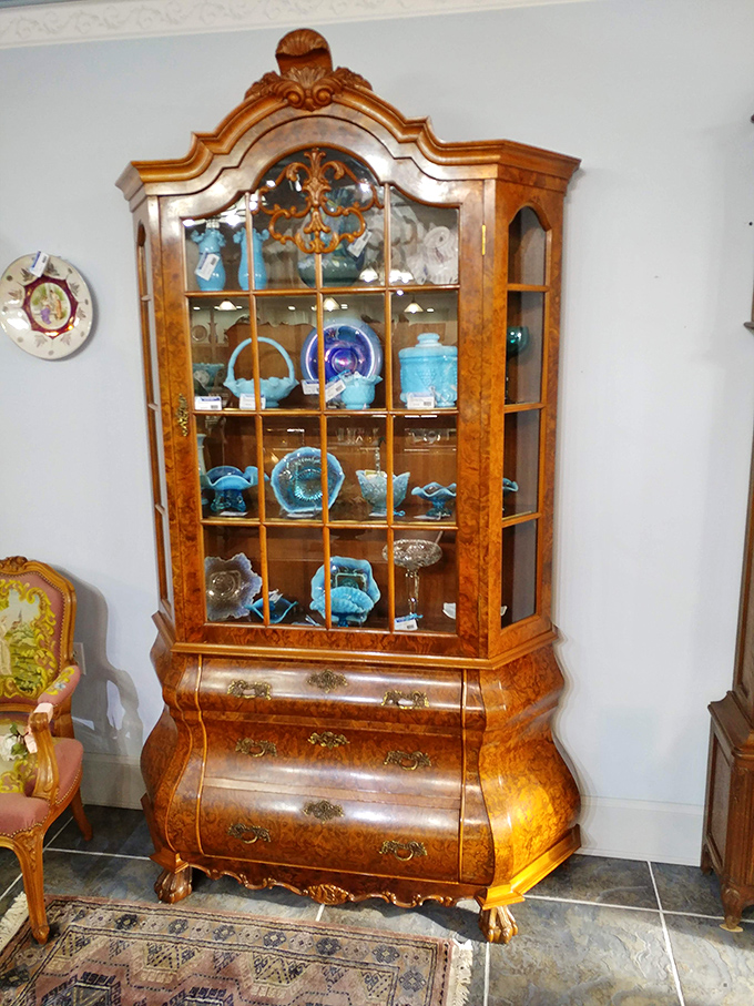 This Dutch Chippendale-style cabinet didn't just survive decades&mdash;it thrived, its burled wood and curved glass more beautiful now than the day it was crafted.