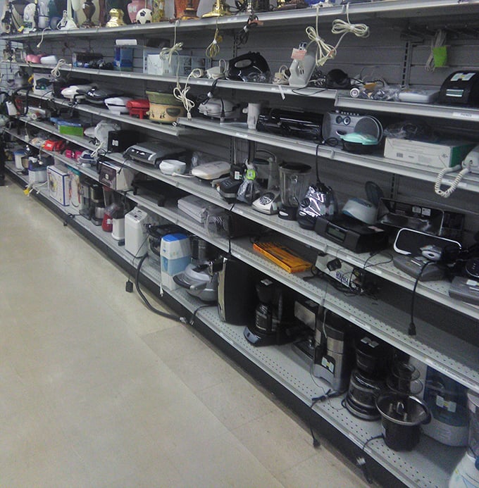 The small appliance graveyard where coffee makers and blenders await resurrection. One person's obsolete technology is another's retro treasure.