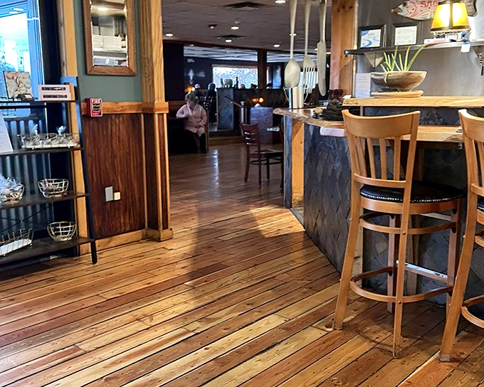 The entryway reveals the restaurant's soul: warm wood, natural light, and the promise of a meal worth remembering long after the check arrives.