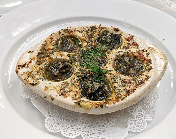 Escargot that could convert the skeptics &ndash; these garlicky, herb-butter bathed beauties aren't just snails, they're little vessels of French culinary tradition done absolutely right.