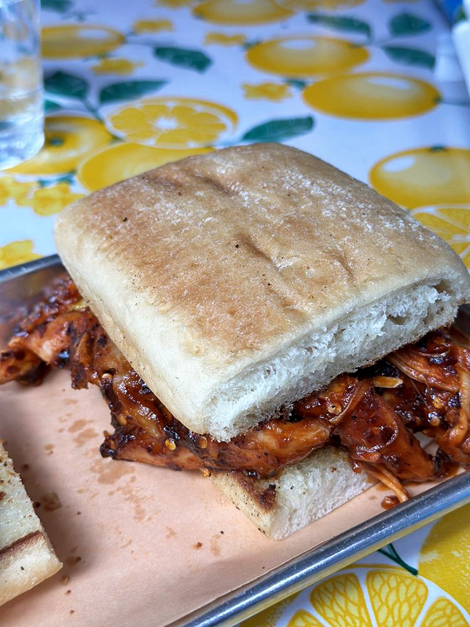 The Firebird sandwich doesn't just satisfy hunger&mdash;it creates memories with each bite of that pillowy bread and caramelized meat.