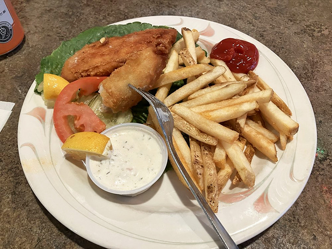 Fish and chips that crackle with each bite, served with a side of nostalgia and tartar sauce that means business.