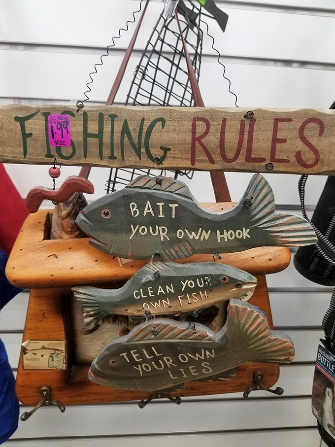 "Bait your own hook" and other fishy wisdom adorns this whimsical wall hanging&mdash;perfect for the Florida lake house you're decorating on a dime.
