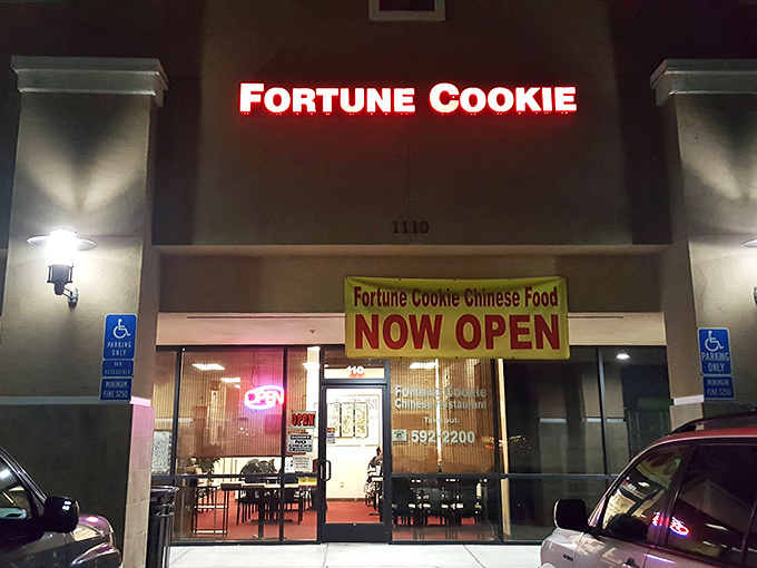 Even in small-town California, diverse dining options abound – Fortune Cookie's glowing sign welcomes hungry visitors well into the evening hours.