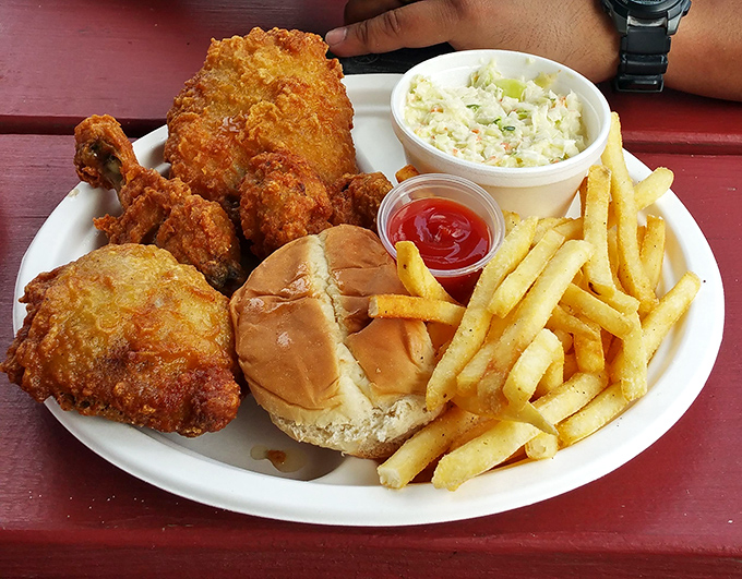 Fried chicken that would make Colonel Sanders nervously adjust his tie, served with sides that understand their supporting role in this crispy drama.