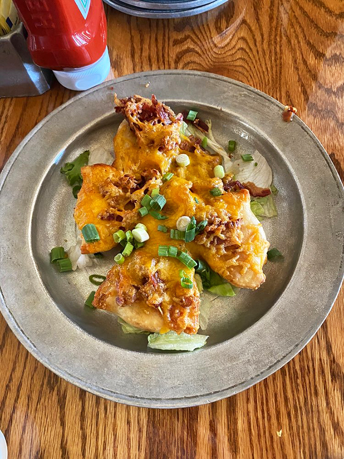 Pierogis wearing a cheese blanket and green onion confetti—comfort food dressed for a party it plans to steal the show at.