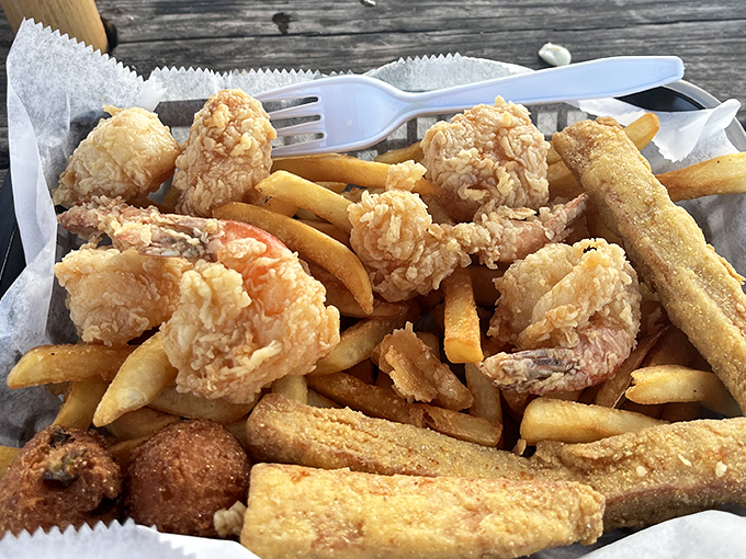 Fried shrimp and fries&mdash;comfort food with a coastal upgrade. These golden crustaceans make chicken nuggets weep with inadequacy.
