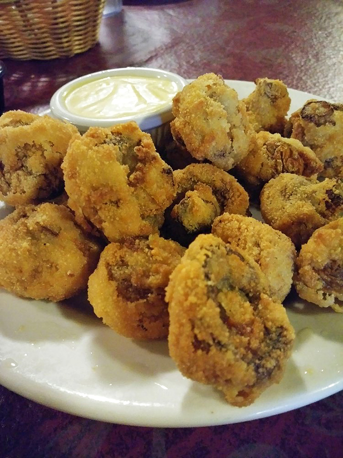 These fried mushrooms aren't just appetizers, they're little golden orbs of happiness that make you wonder why vegetables ever got a bad rap.