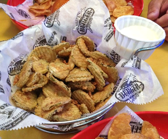 Fried pickles: the appetizer you didn't know you needed until they arrived at your table. Crispy, tangy perfection waiting for that dipping sauce.