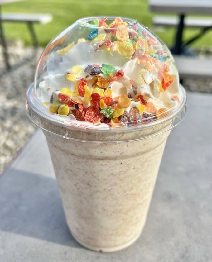 The Fruity Pebbles milkshake&mdash;where childhood breakfast rebellion meets adult dessert indulgence in a cup that's basically joy in liquid form.